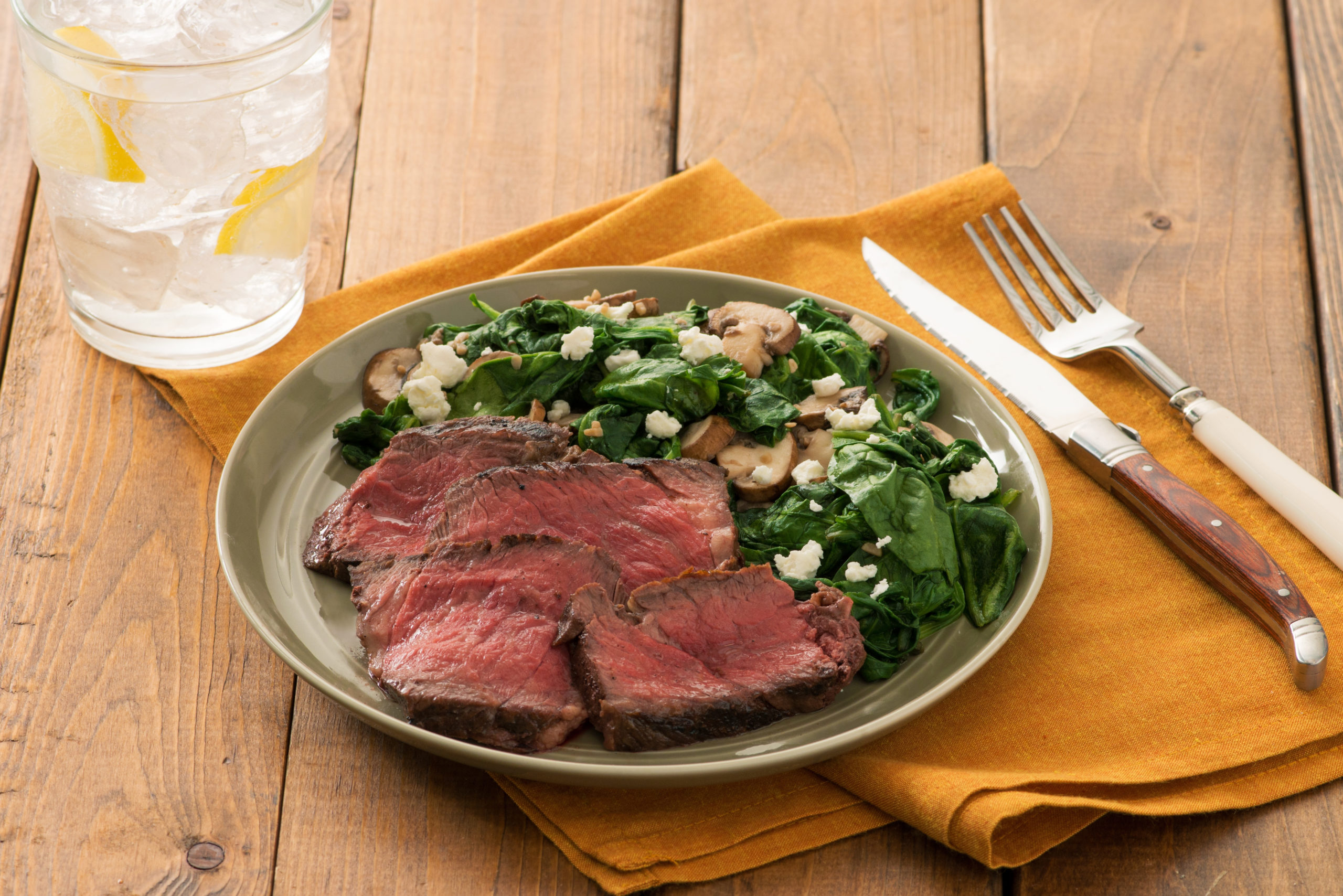 Grilled Flank with Tomatoes and Brown Butter Garlic Sauce
